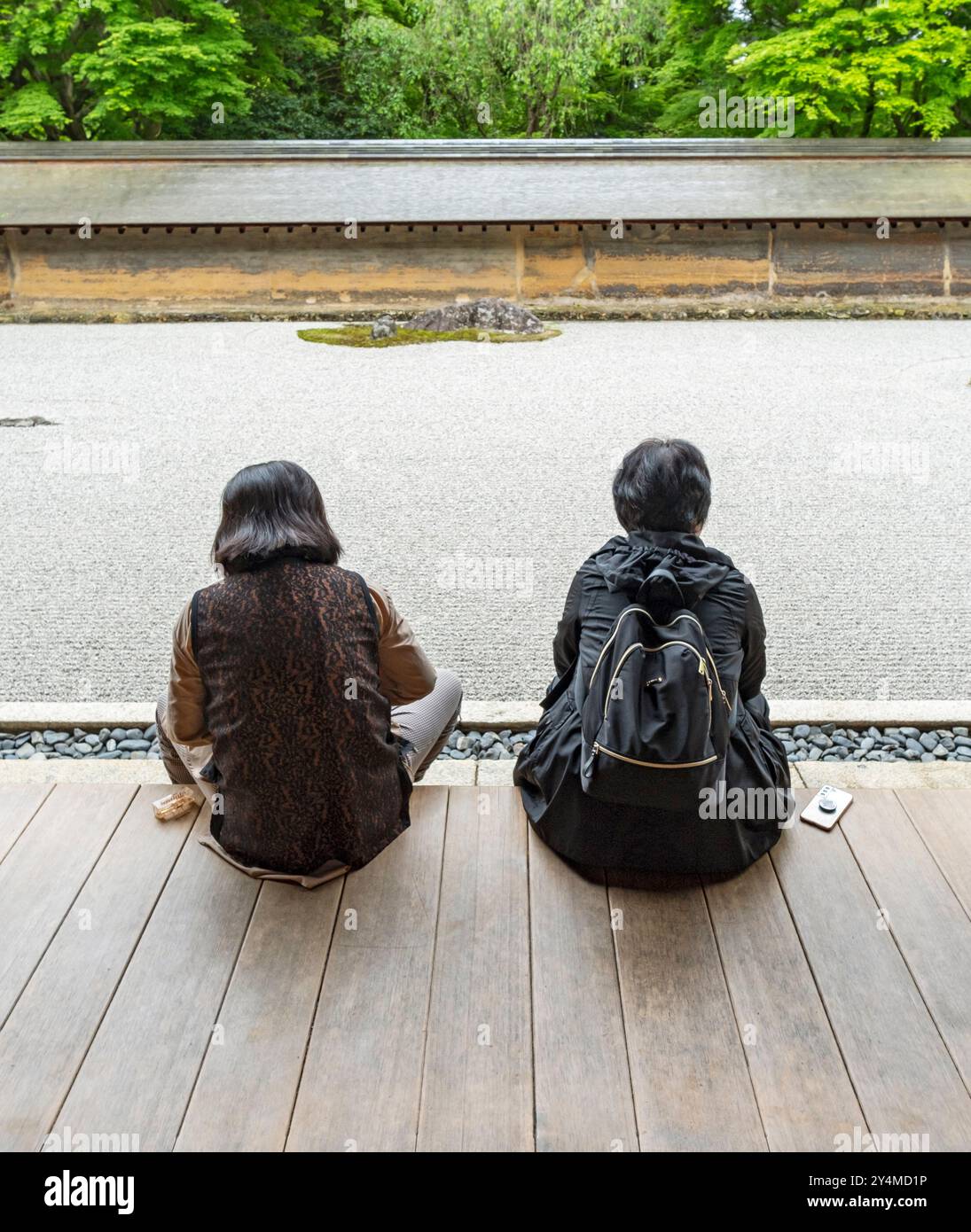 Visitors at Kare-sansui - dry landscape Zen temple garden, Ryoan-ji ...