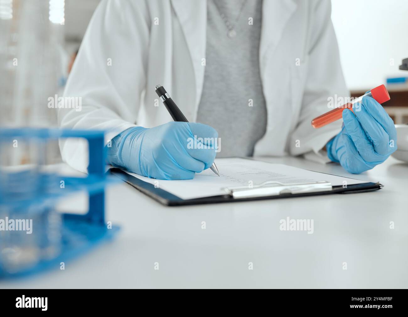 Laboratory, person and test tube with clipboard for writing, medicine ...
