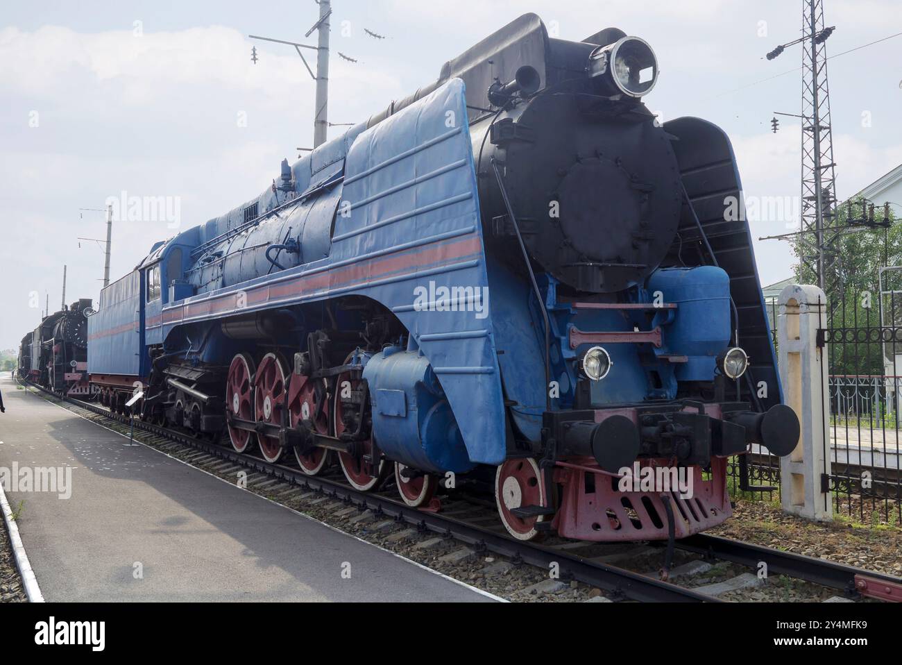 The blue express steam locomotive which is accelerating momentum 125 km ...