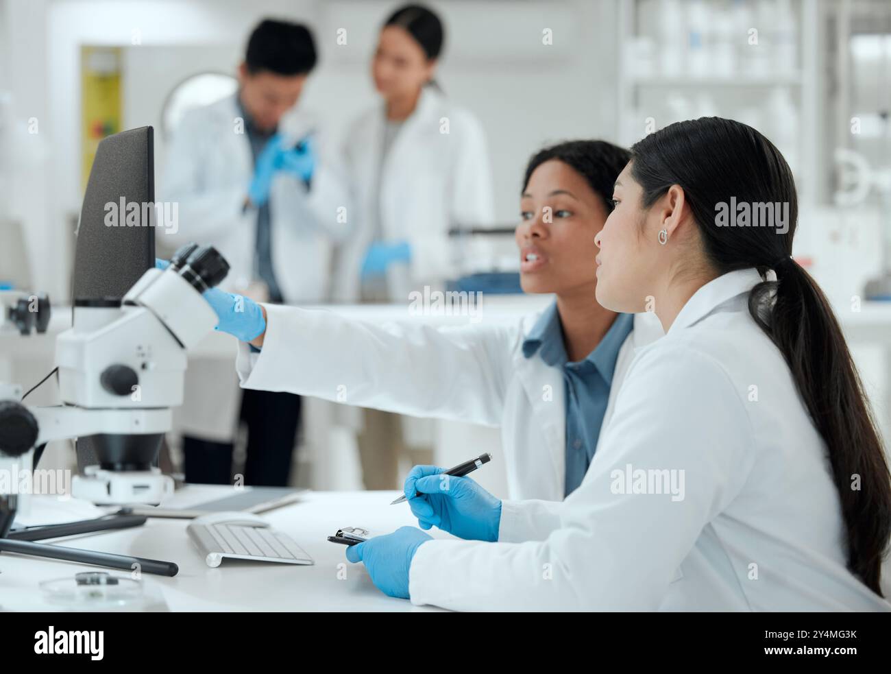 Science, women and team with microscope in lab for medical experiment ...