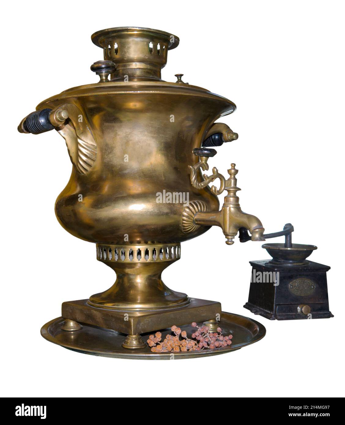Samovar and coffee grinder is made in 1901-is isolated on the white ...