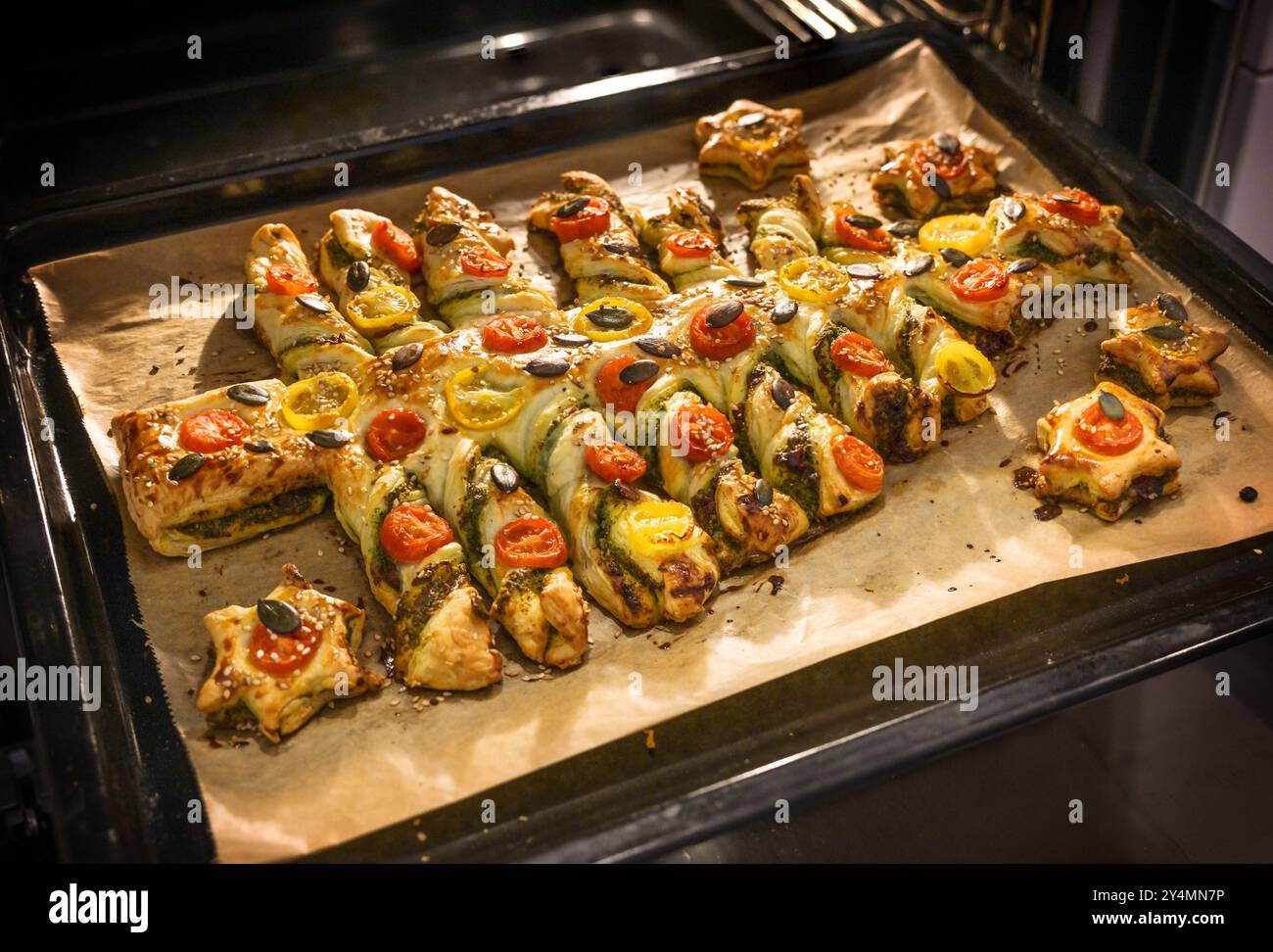 Baked savory Christmas tree fresh from the oven from puff pastry filled ...