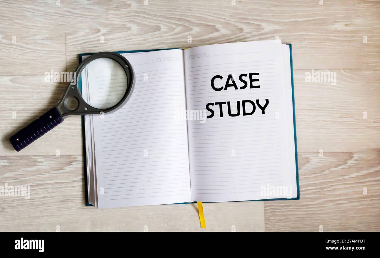 Card with case study text on a white background with office items ...