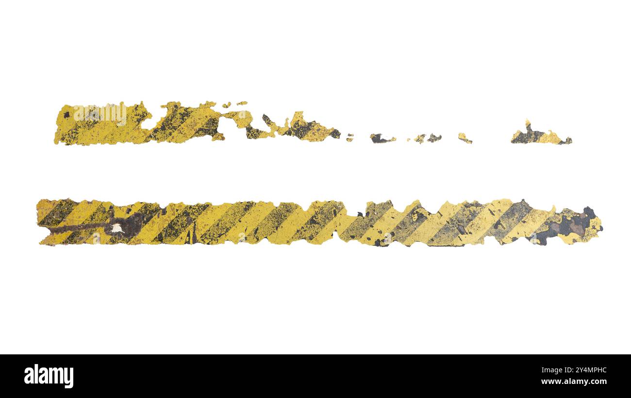 Damaged yellow and black barricade tape on white background with ...