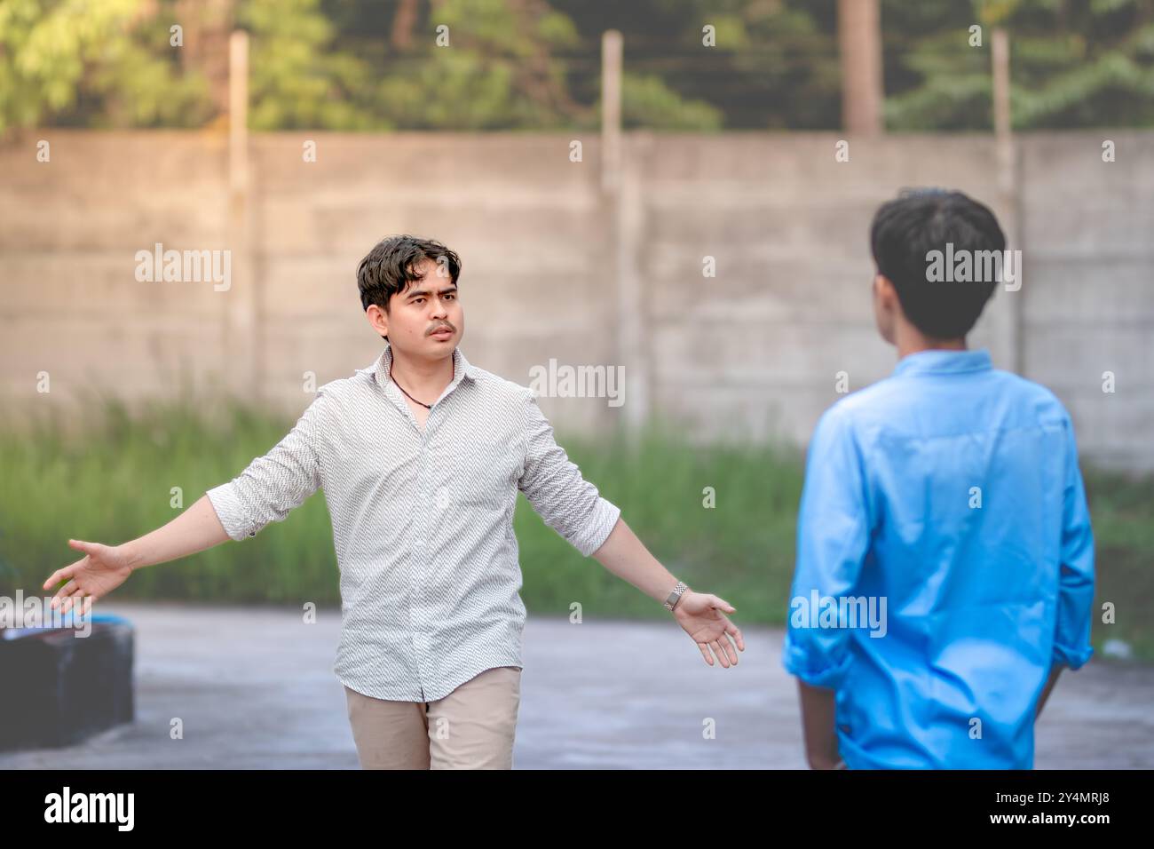 Angry men trying to start a fight. A dispute between men. A guy ...