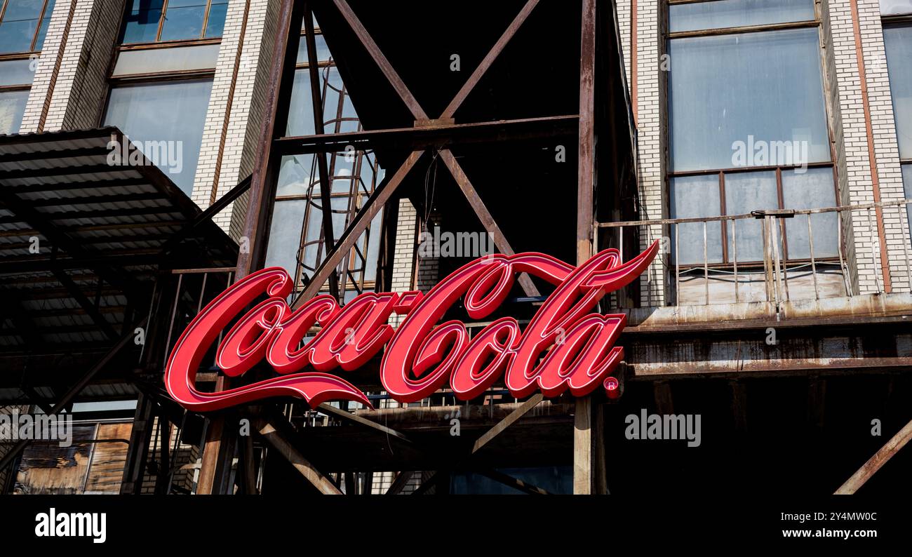 Minsk, Belarus, September 19, 2024 - Coca Cola logo on building. Vintage advertising american ...