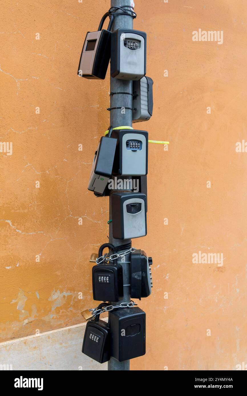Key Boxes for on a Pole in Rome, Italy Stock Photo - Alamy