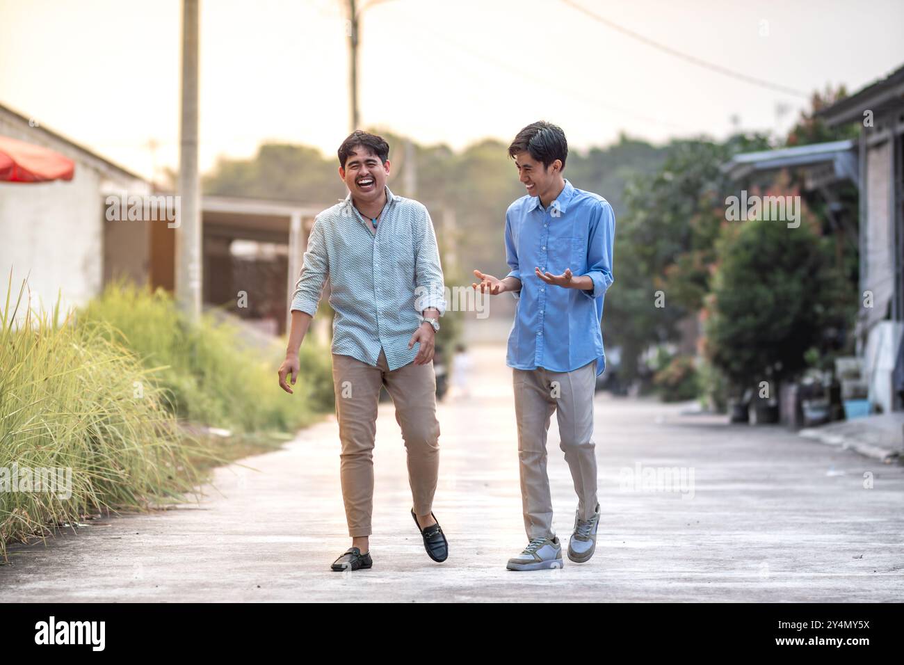 Young businessman discussing for their business. Happy young executive ...