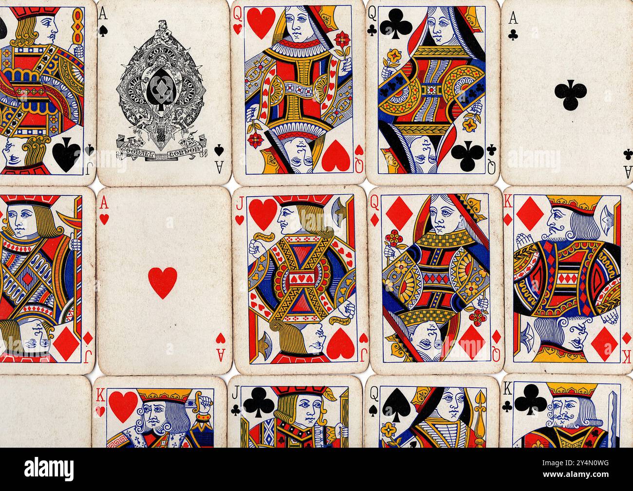 A montage of vintage playing cards showing aces, kings, queens and ...