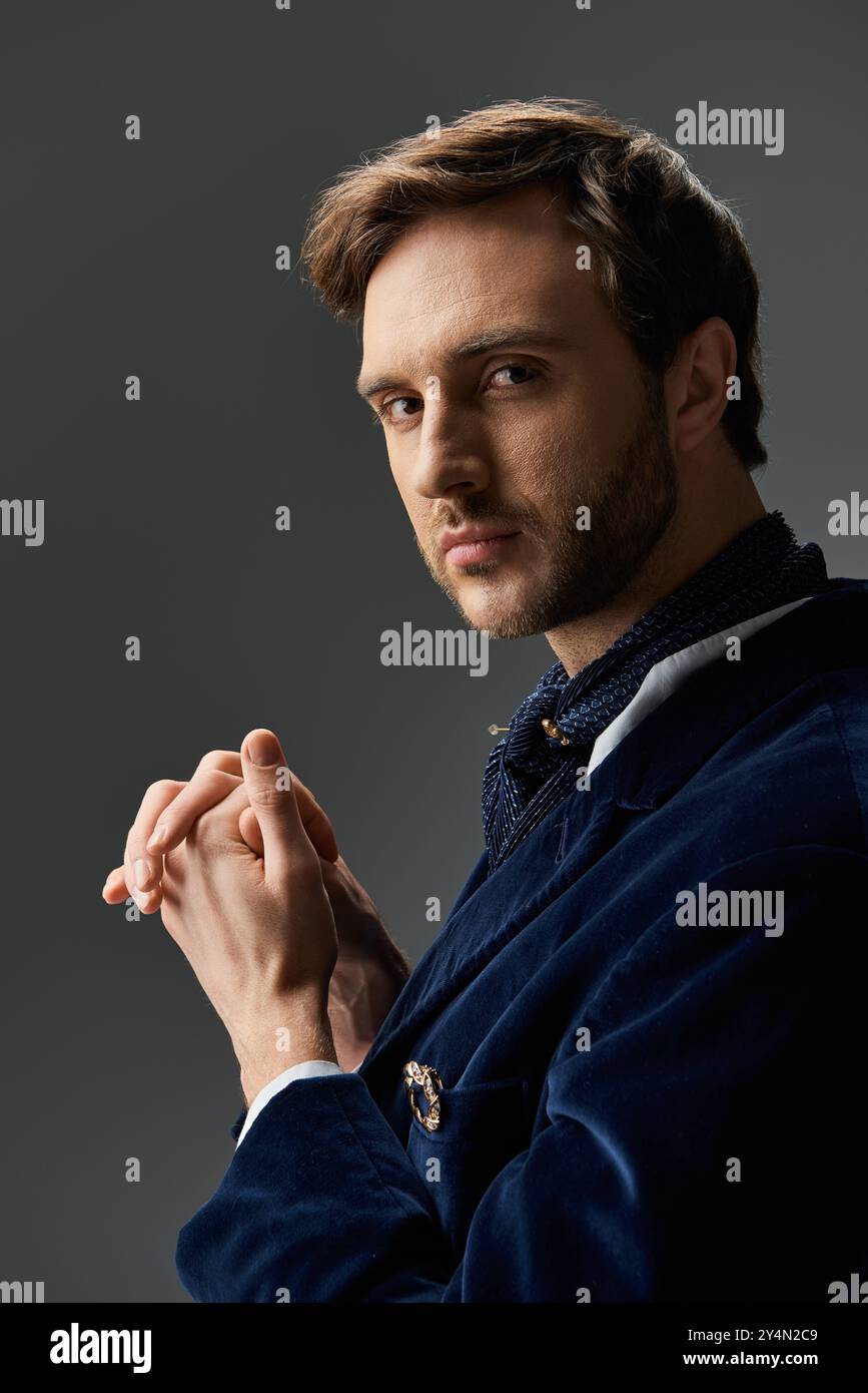 A stylish man with a confident expression showcases his dandy fashion ...