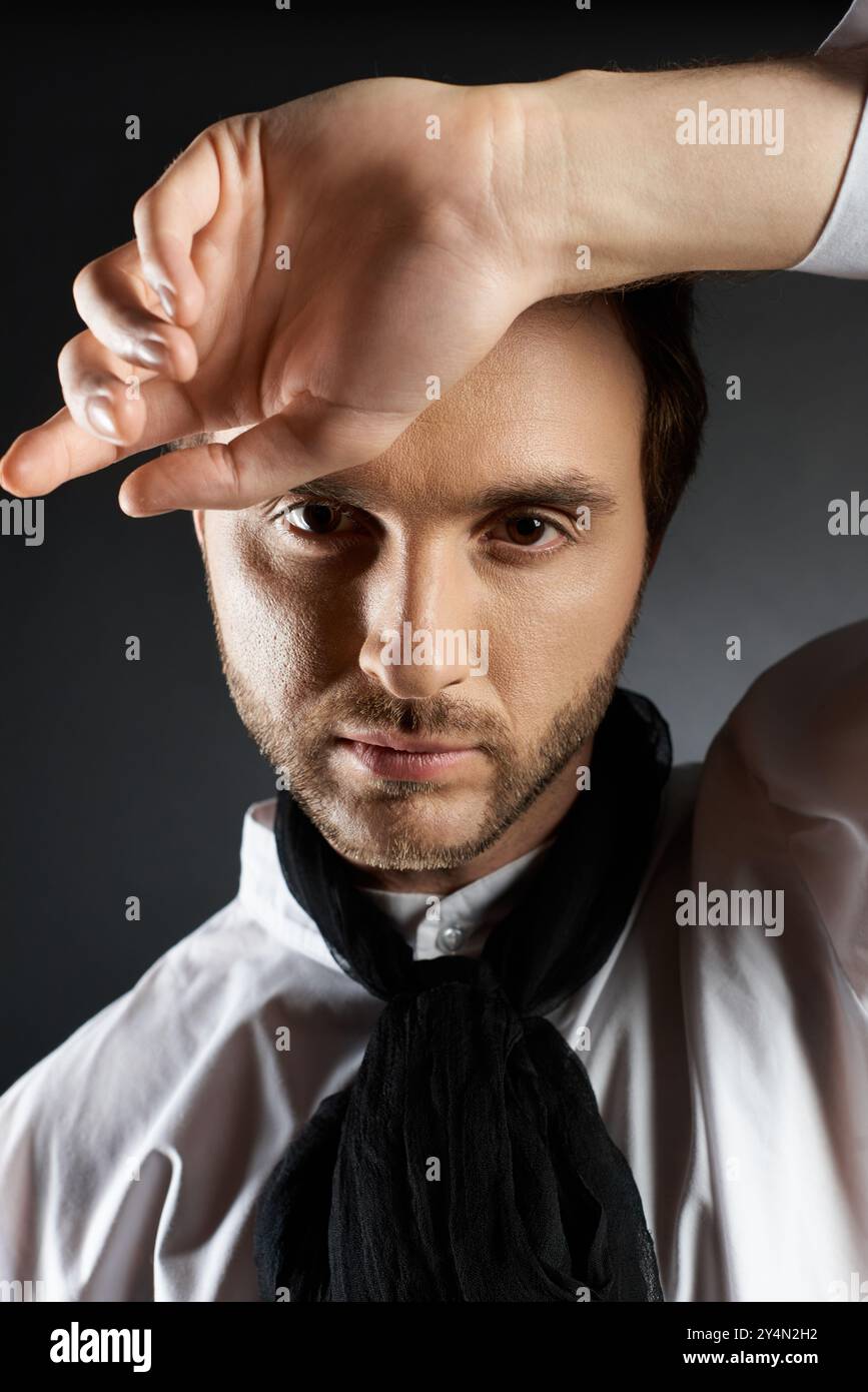 A handsome individual showcases a fashionable style with an intriguing ...