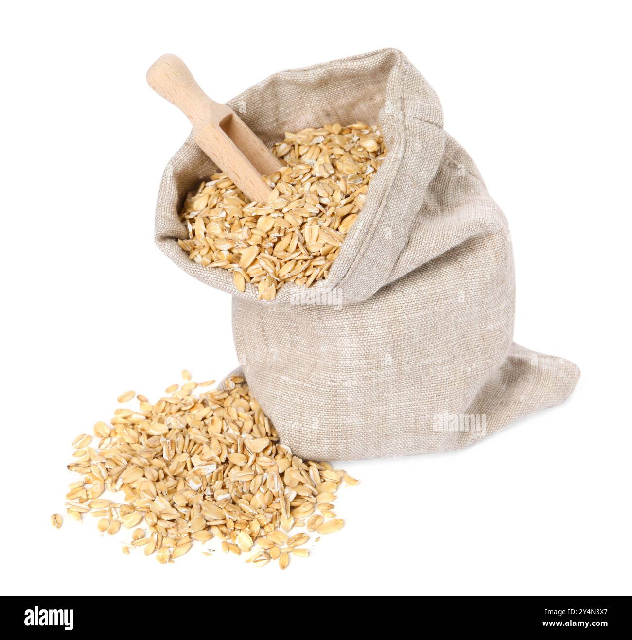 Dry oat flakes in burlap sack and wooden scoop isolated on white Stock ...