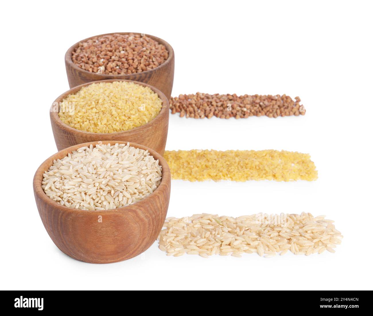 Different types of cereals in bowls isolated on white Stock Photo - Alamy