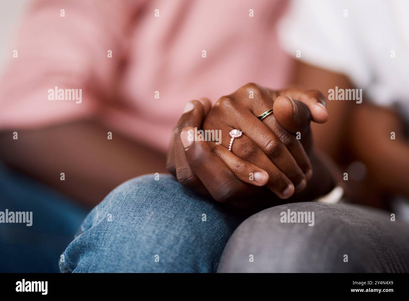Closeup, holding hands and black couple with ring for proposal ...