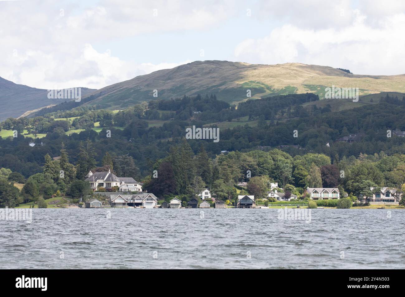 A view of the shores of Lake Windermere during a boat journey Stock ...