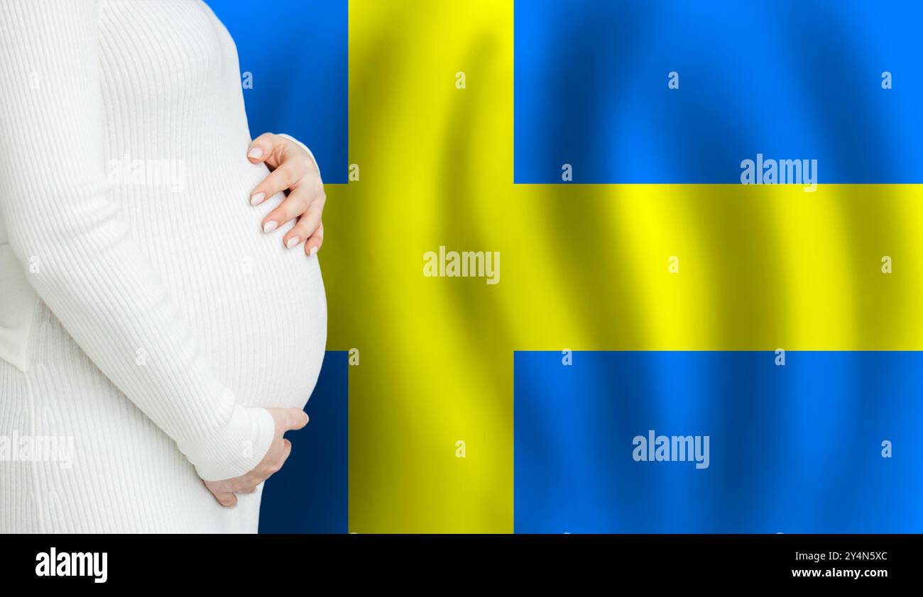 Swedish pregnant woman belly against Swedish flag background ...