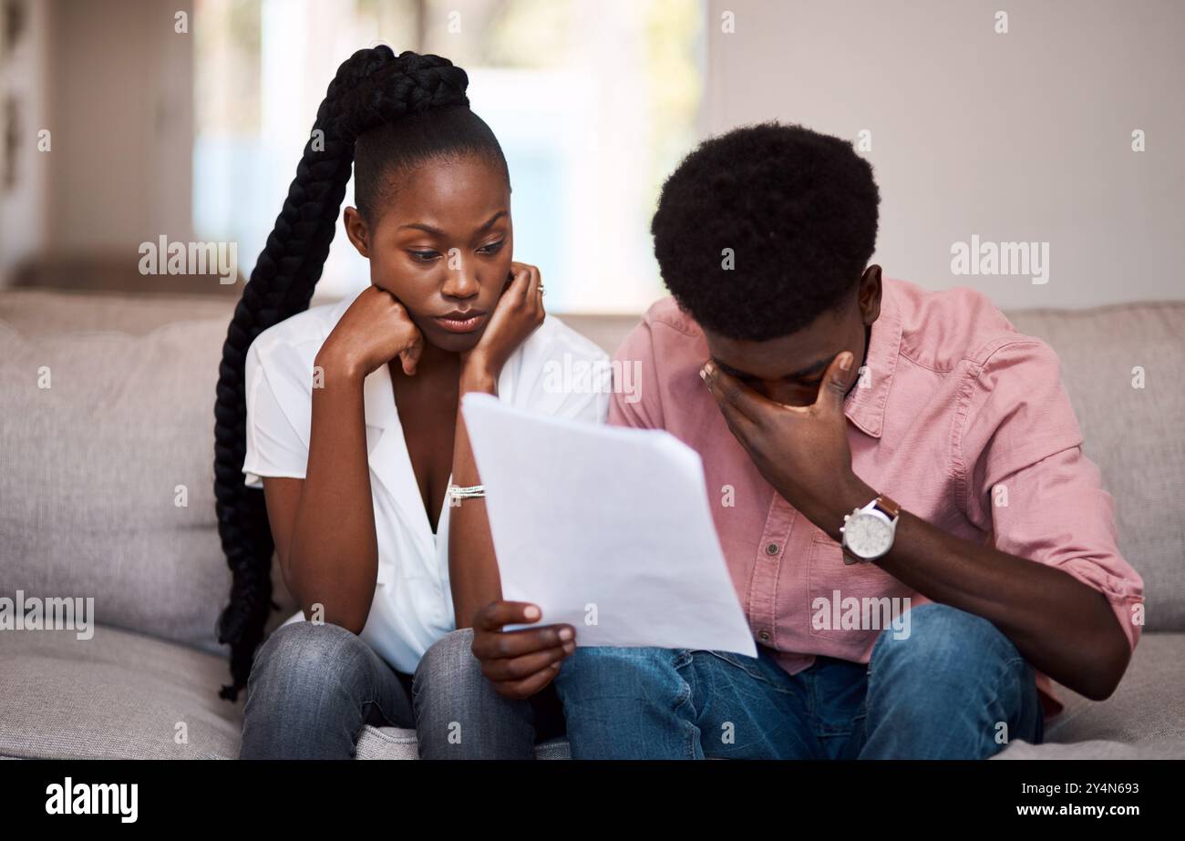 Home, worry and black couple with discussion for document, financial ...