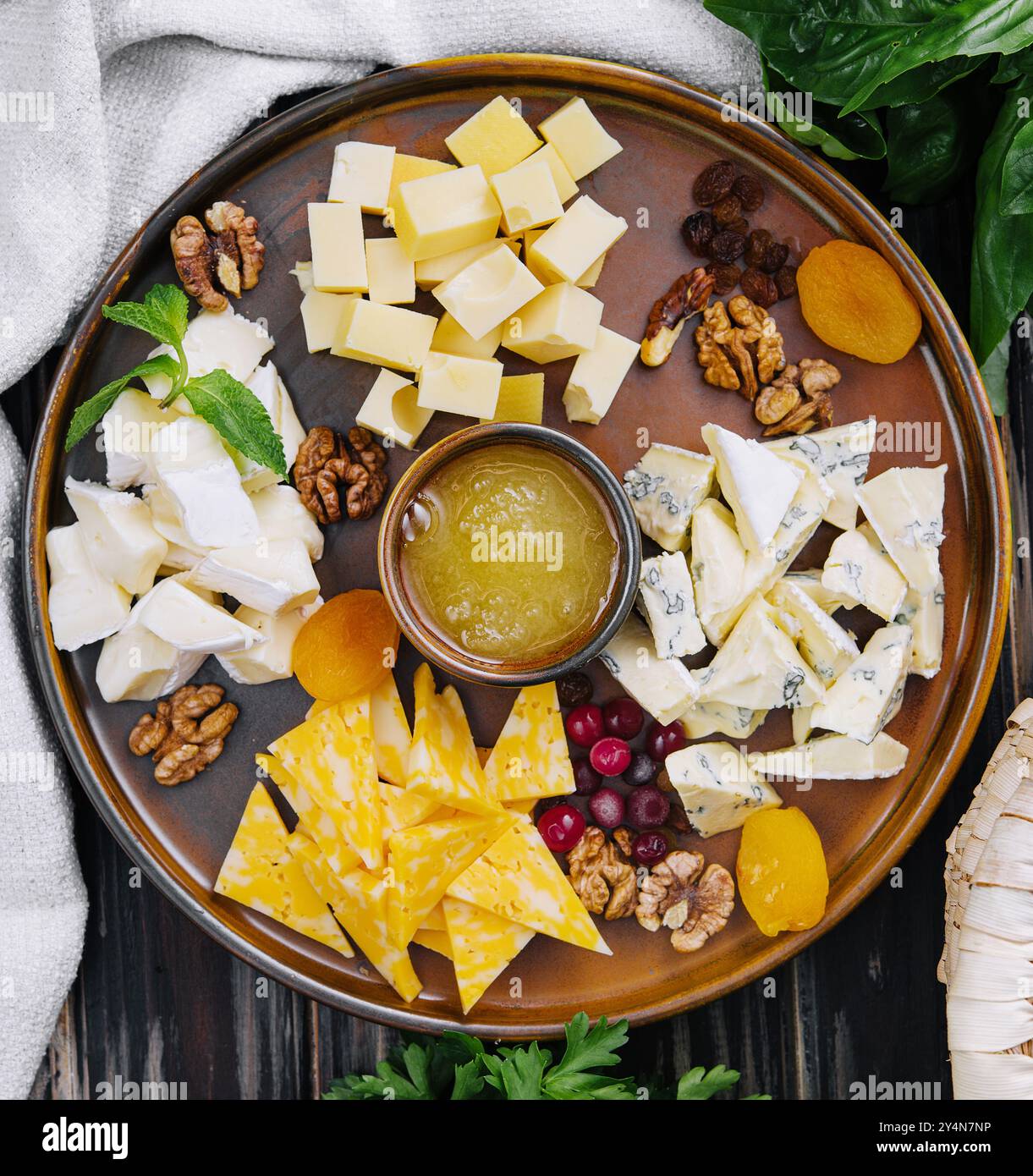 Different types of delicious cheese and snacks Stock Photo - Alamy