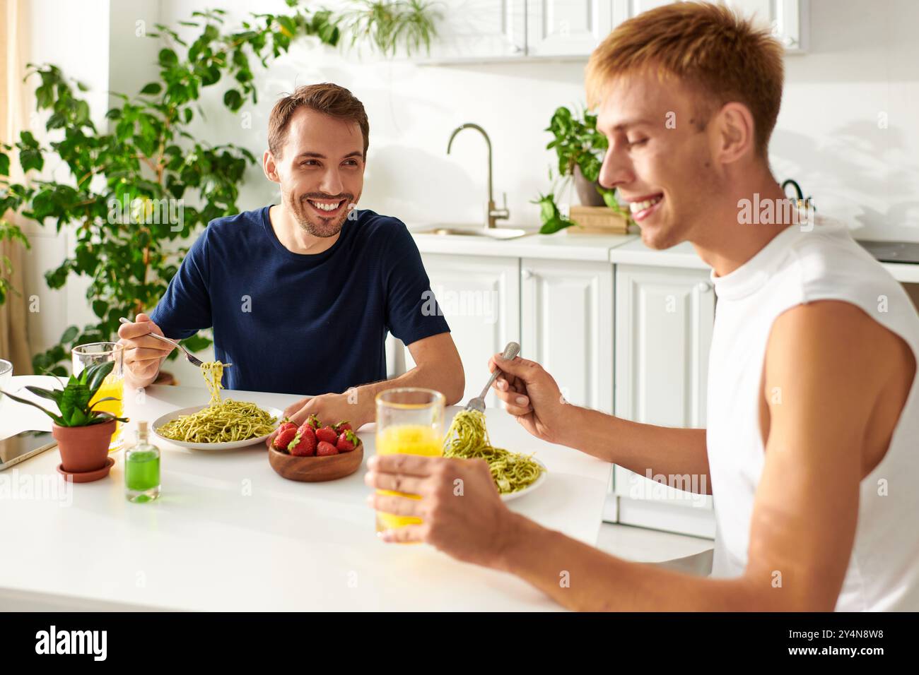 A loving couple shares a delightful moment as eating lunch in their ...