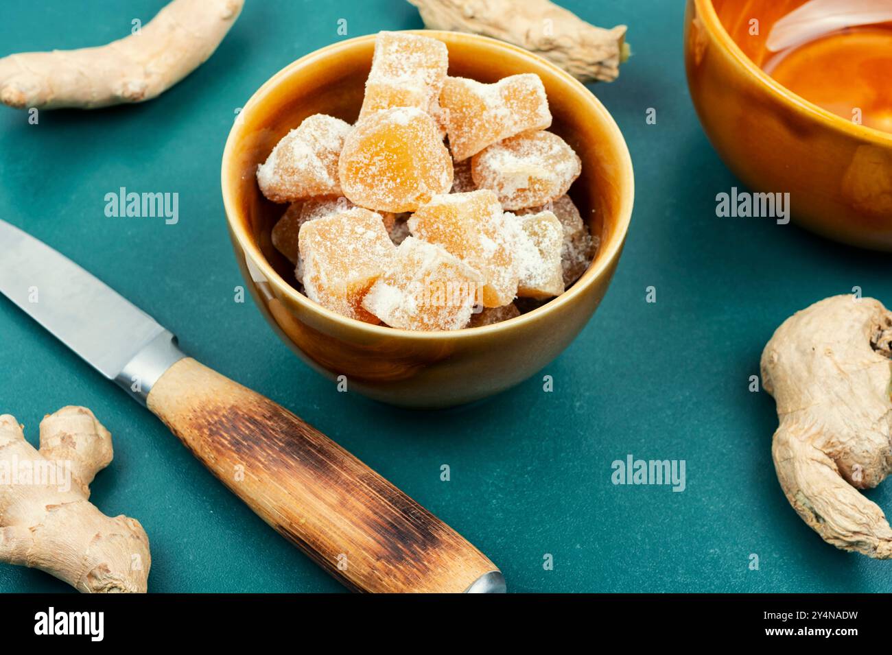 Candied ginger cubes, candied ginger dessert in bowl. Healthy sweets ...
