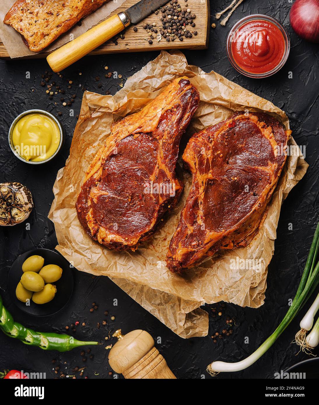 Marinated t bone beef steak top view Stock Photo - Alamy