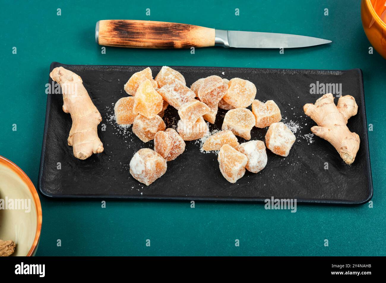 Sweet and spicy candied ginger, candied ginger dessert Stock Photo - Alamy