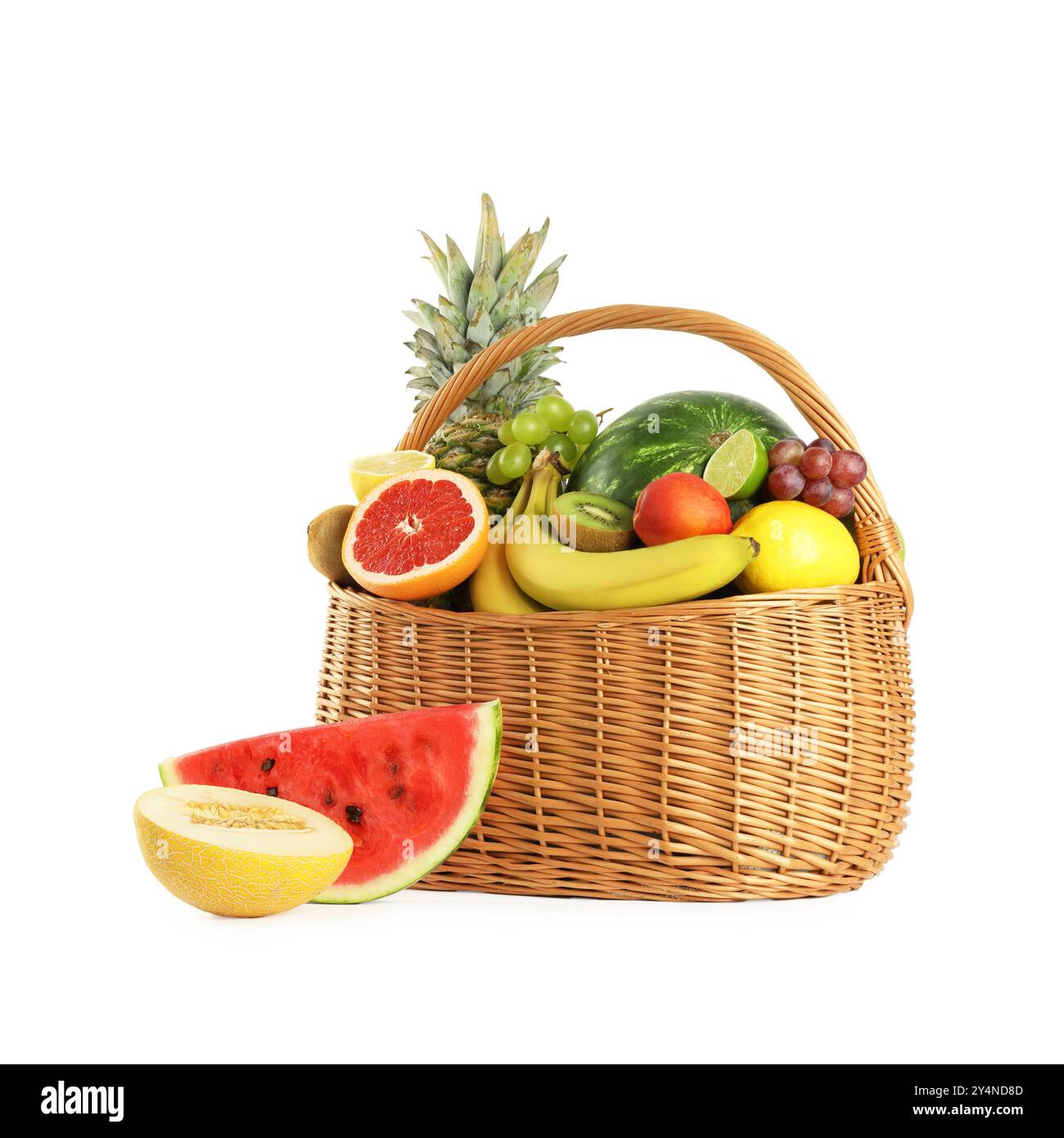 Many fresh ripe fruits in basket isolated on white Stock Photo - Alamy