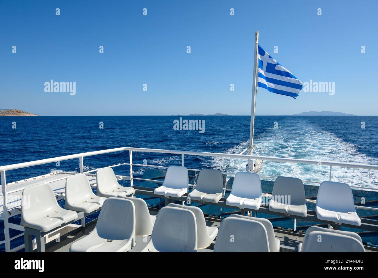 Deck of ferry with Greek flag. Aegean Sea, Cyclades, Greece Stock Photo ...