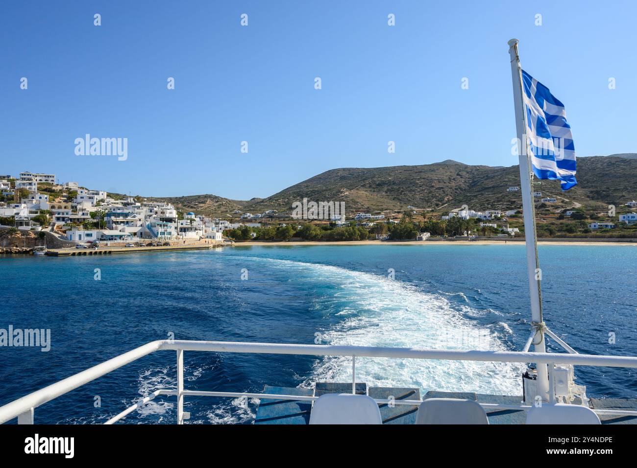 Deck of ferry with Greek flag leaving Donousa island. Cyclades, Greece ...