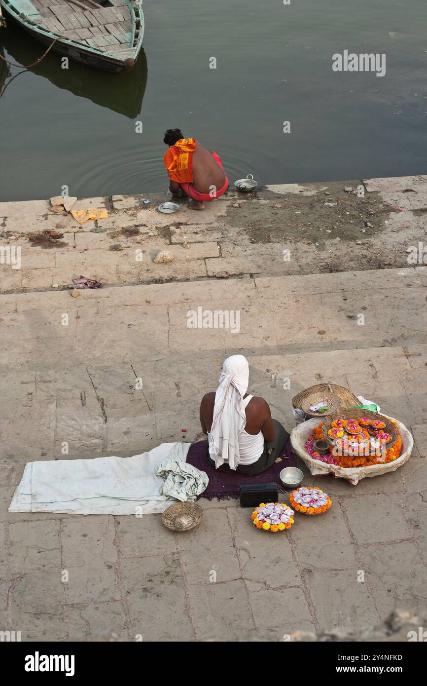 Varanasi, Uttar Pradesh / India - May 7,2015 : Two men at Ganga ghat ...