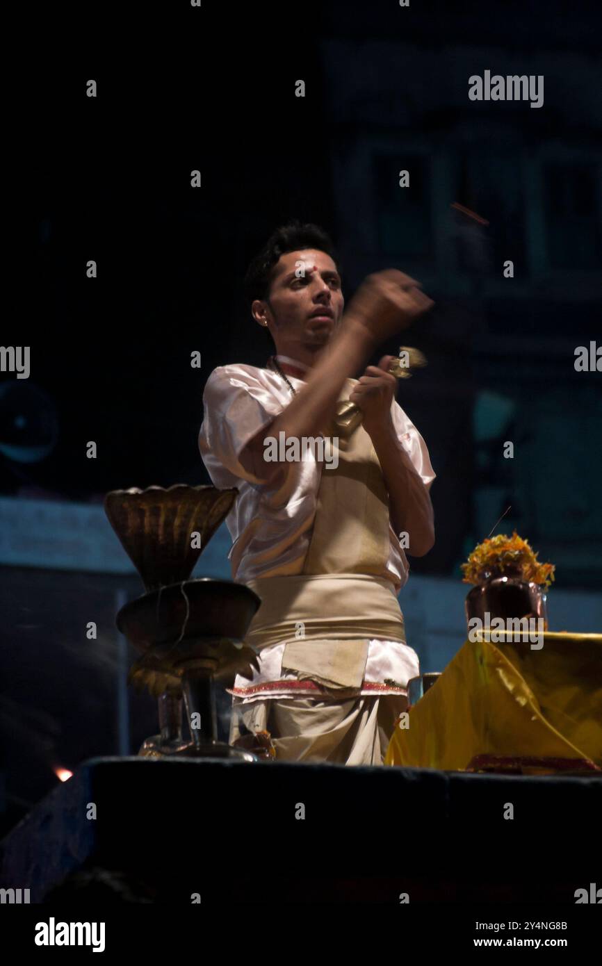 Varanasi, Uttar Pradesh / India - May 7, 2015 : Priest performing the ...