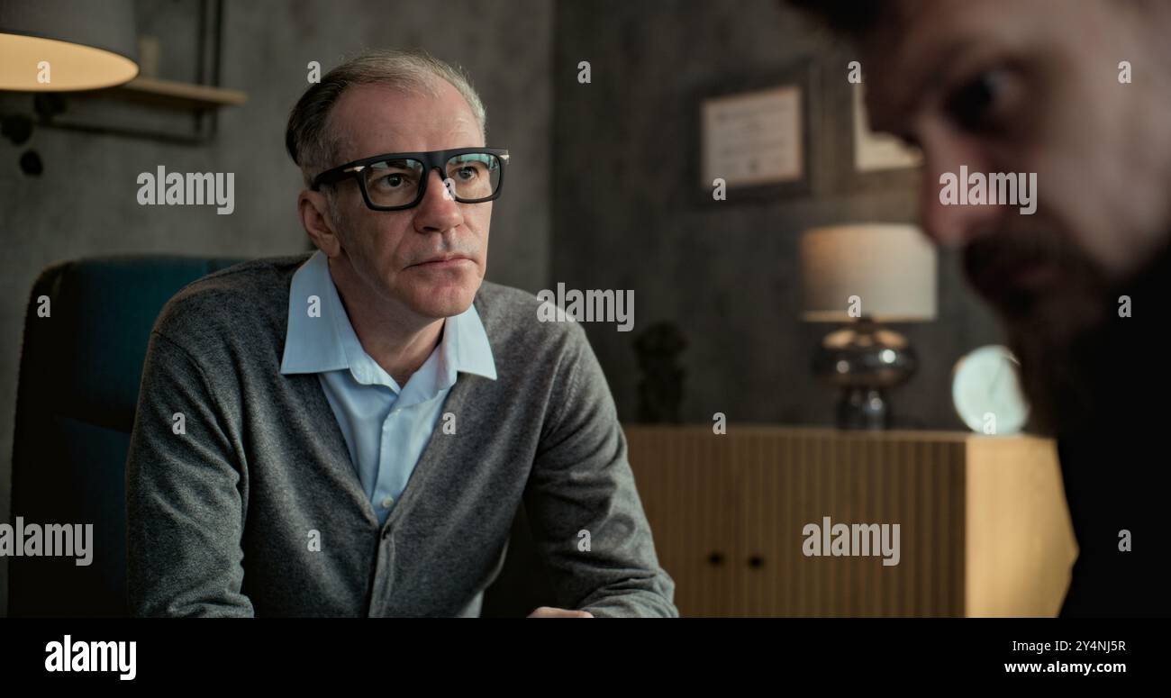 Senior psychologist conducts therapy session to soldier with post ...