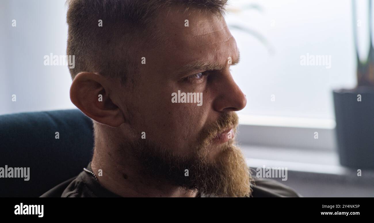 Portrait of depressed military man with PTSD crying, closing his eyes ...