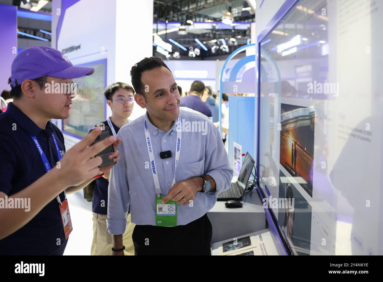 Hangzhou, China's Zhejiang Province. 19th Sep, 2024. A media member learns about the application ...