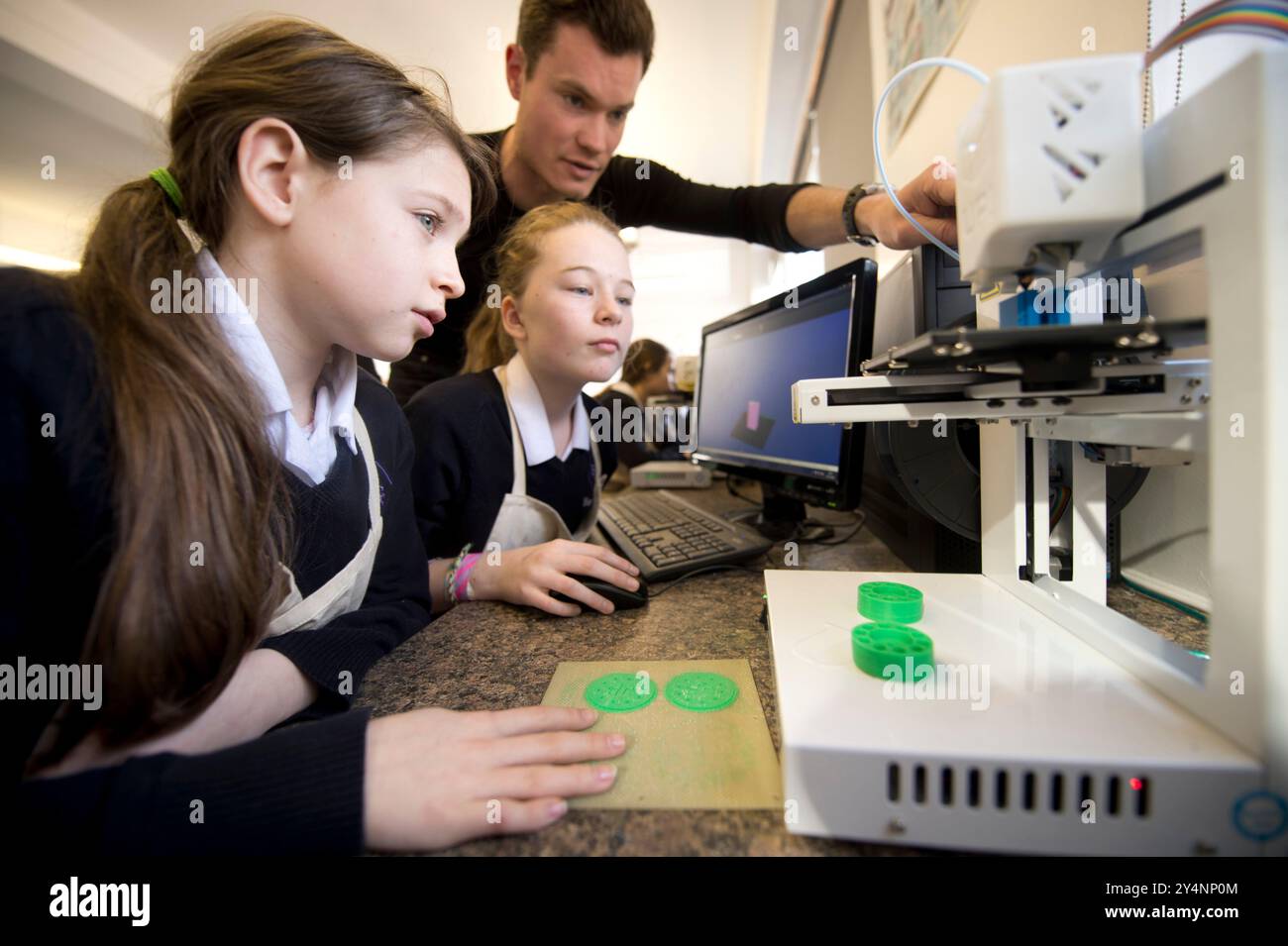 Using a 3D printer during a Design and Technology class at a girls ...