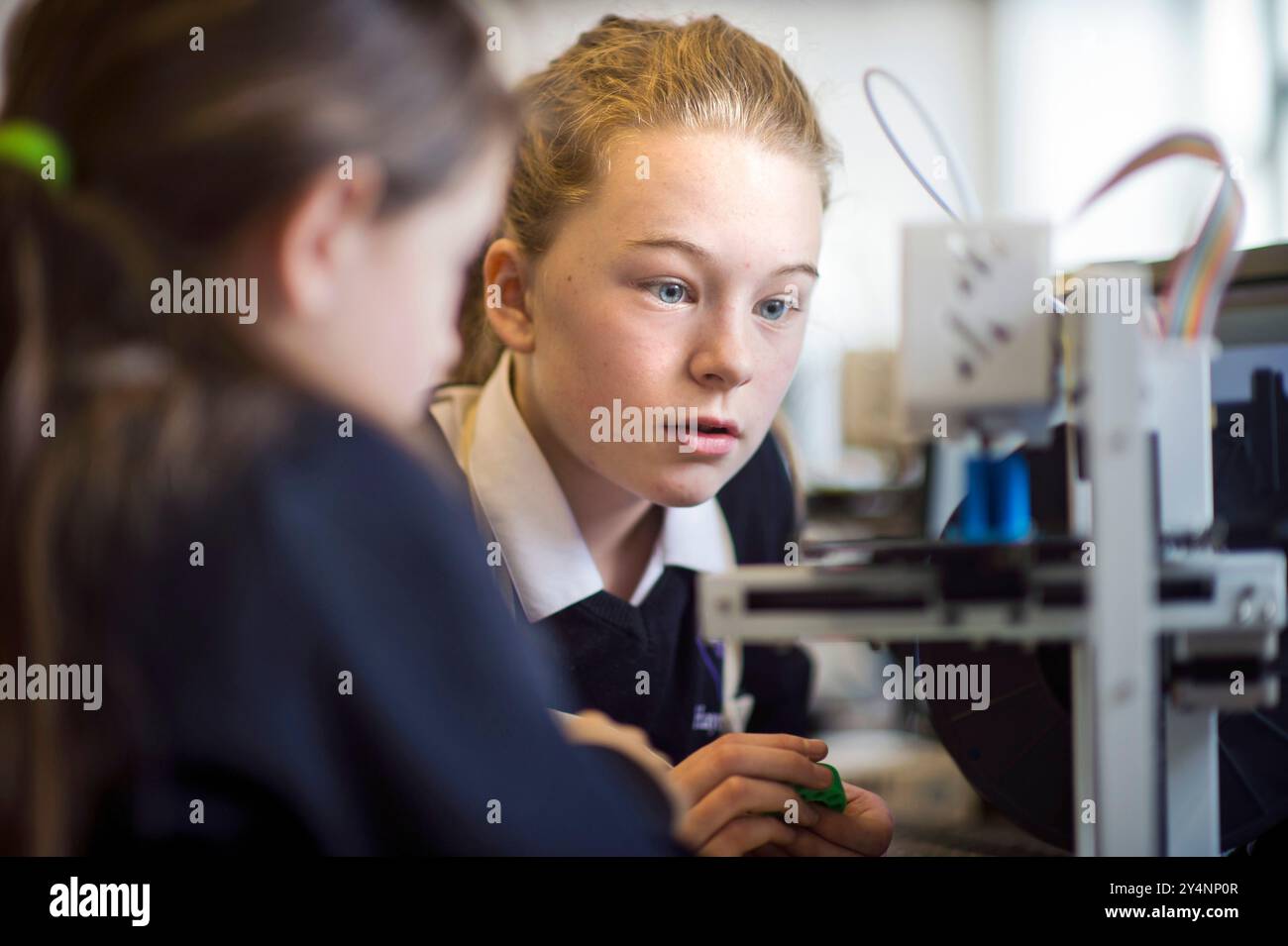 Using a 3D printer during a Design and Technology class at a girls ...
