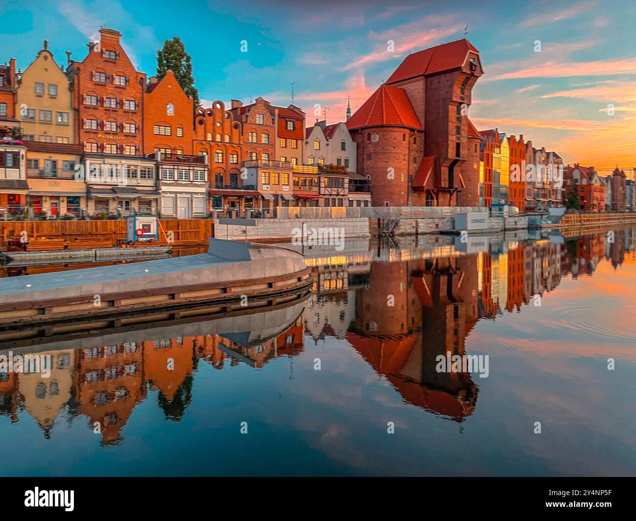 Historic Gdańsk Crane iconic medieval port crane at sunrise, bathed in ...