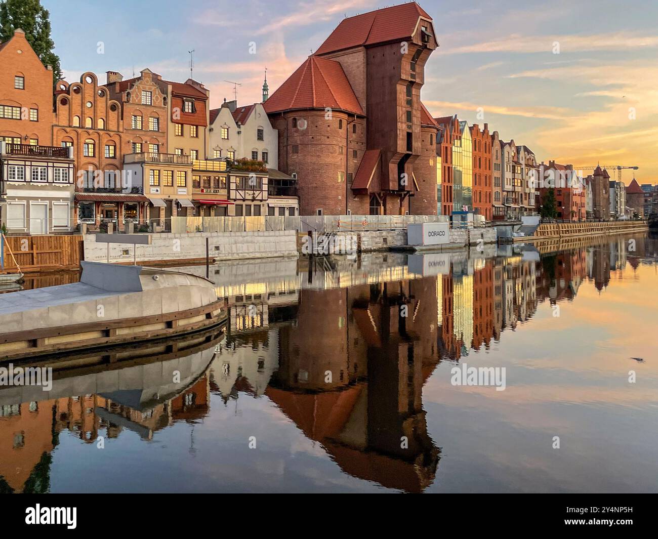 Historic Gdańsk Crane iconic medieval port crane at sunrise, bathed in ...