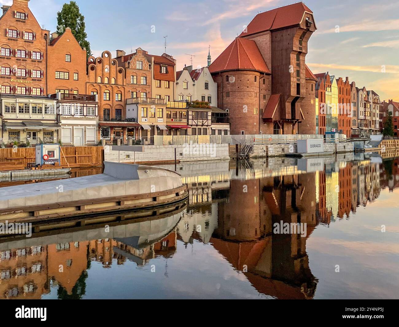 Historic Gdańsk Crane iconic medieval port crane at sunrise, bathed in ...