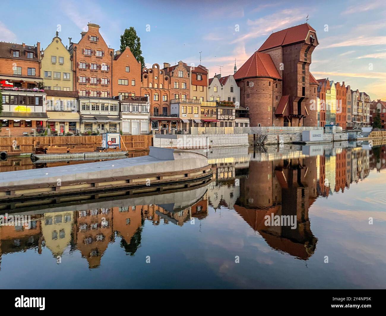 Historic Gdańsk Crane iconic medieval port crane at sunrise, bathed in ...