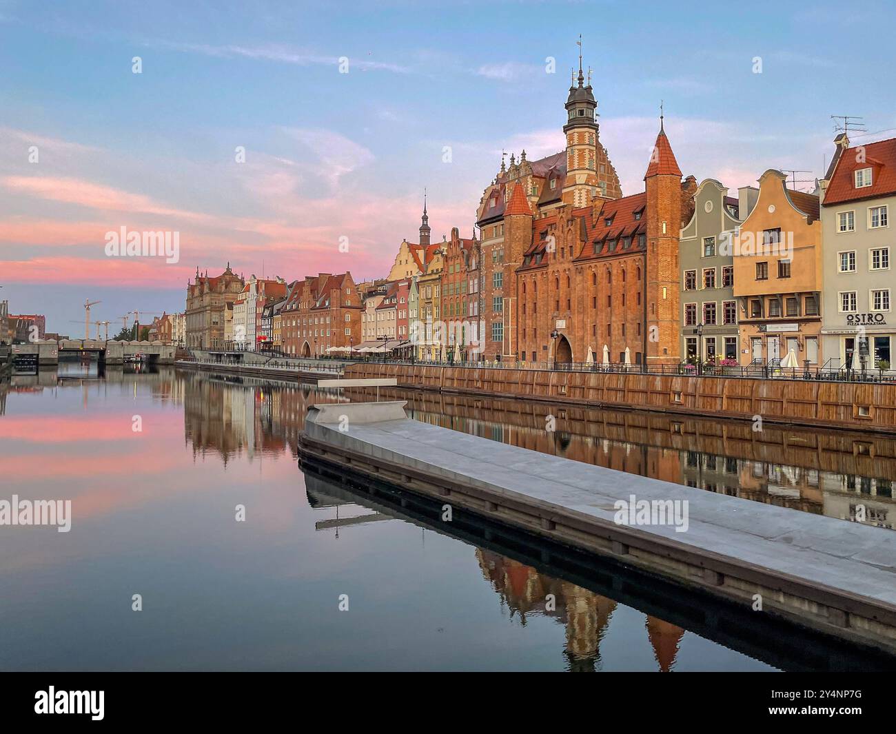 Historic Gdańsk Crane iconic medieval port crane at sunrise, bathed in ...