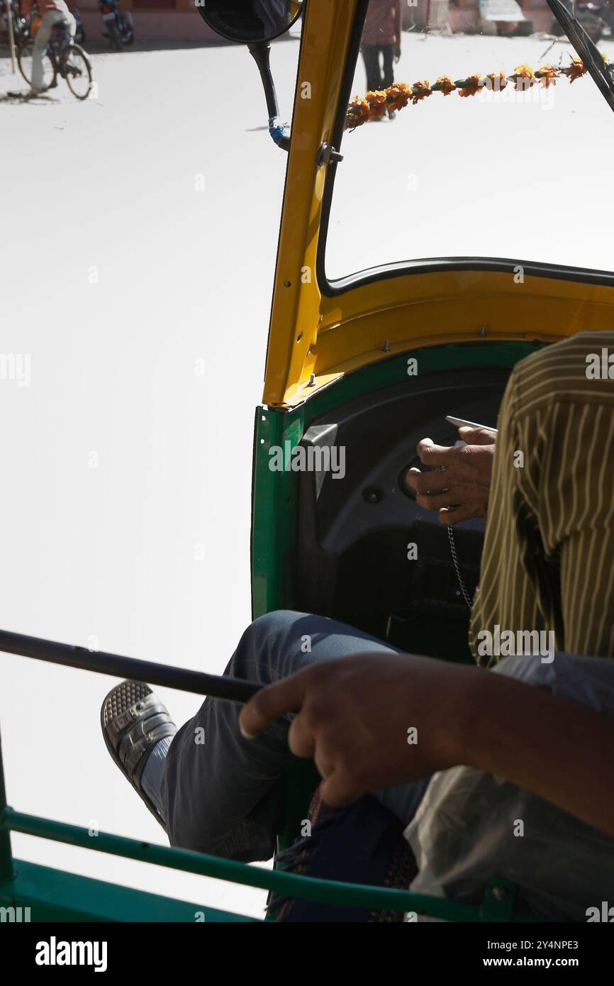 Khambhat, Gujarat / India - January 9, 2011 : A auto rickshaw driver in ...