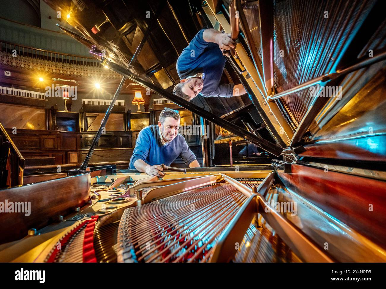 Expert tuner John Tordoff prepares pianos in The Pianodrome at Leeds ...