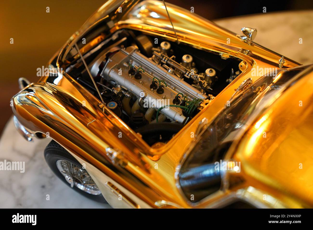 The engine bay of a 24-carat gold-plated model of James Bond's ...
