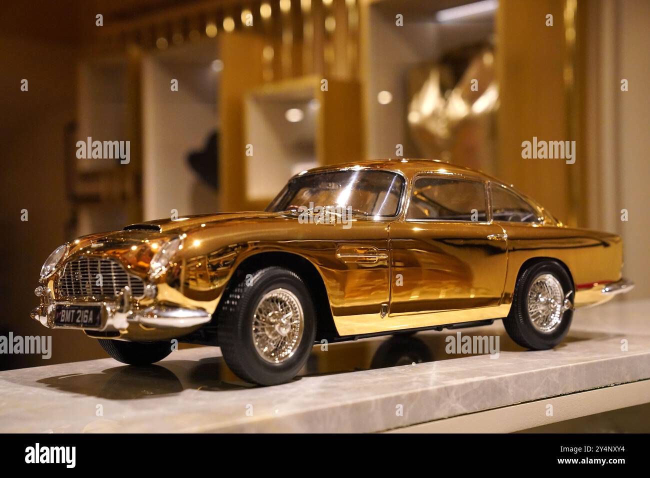 A 24-carat gold-plated model of James Bond's Goldfinger Aston Martin ...