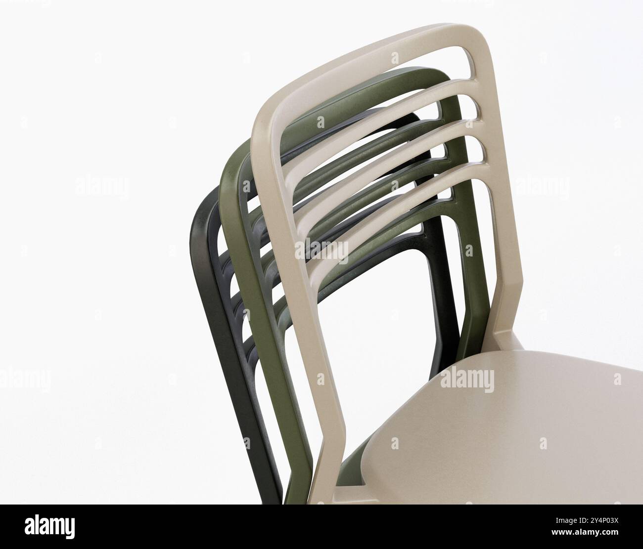 A stack of three modern plastic chairs on an isolated studio background ...