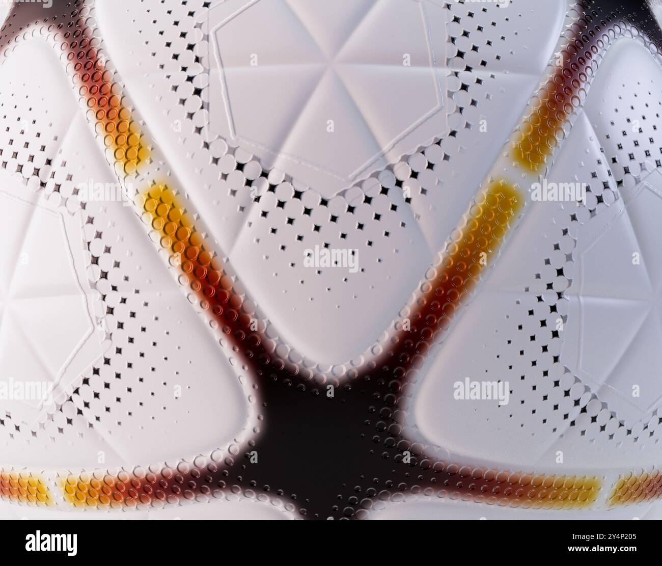 A closeup section of a modern generic moulded soccer football with a ...