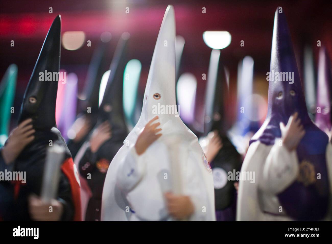 Colorful nazareno figures adorn a shop specializing in Semana Santa ...