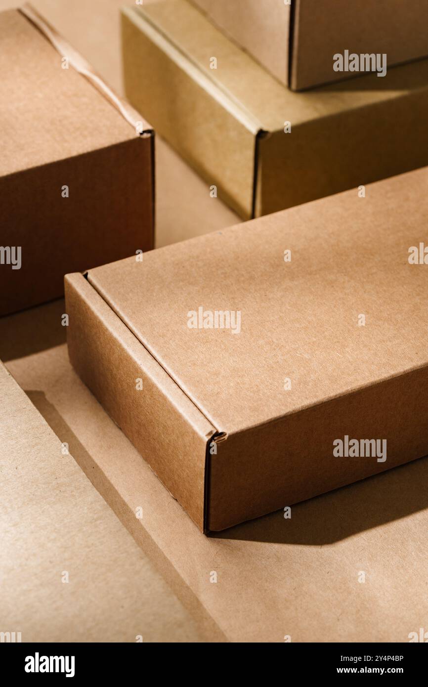 Multiple cardboard boxes arranged on a surface for packaging and ...