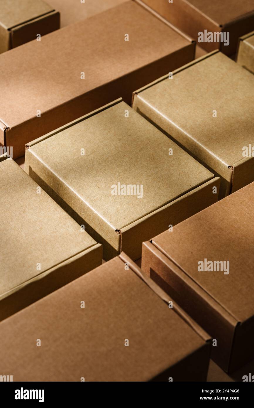 Multiple cardboard boxes arranged on a surface for packaging and ...